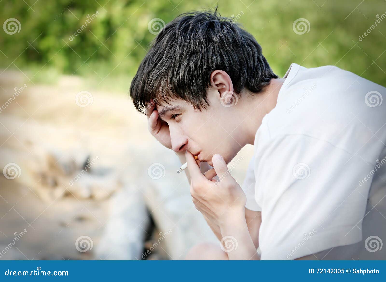 Sad Young Man stock image. Image of sorrowful, smoking - 72142305