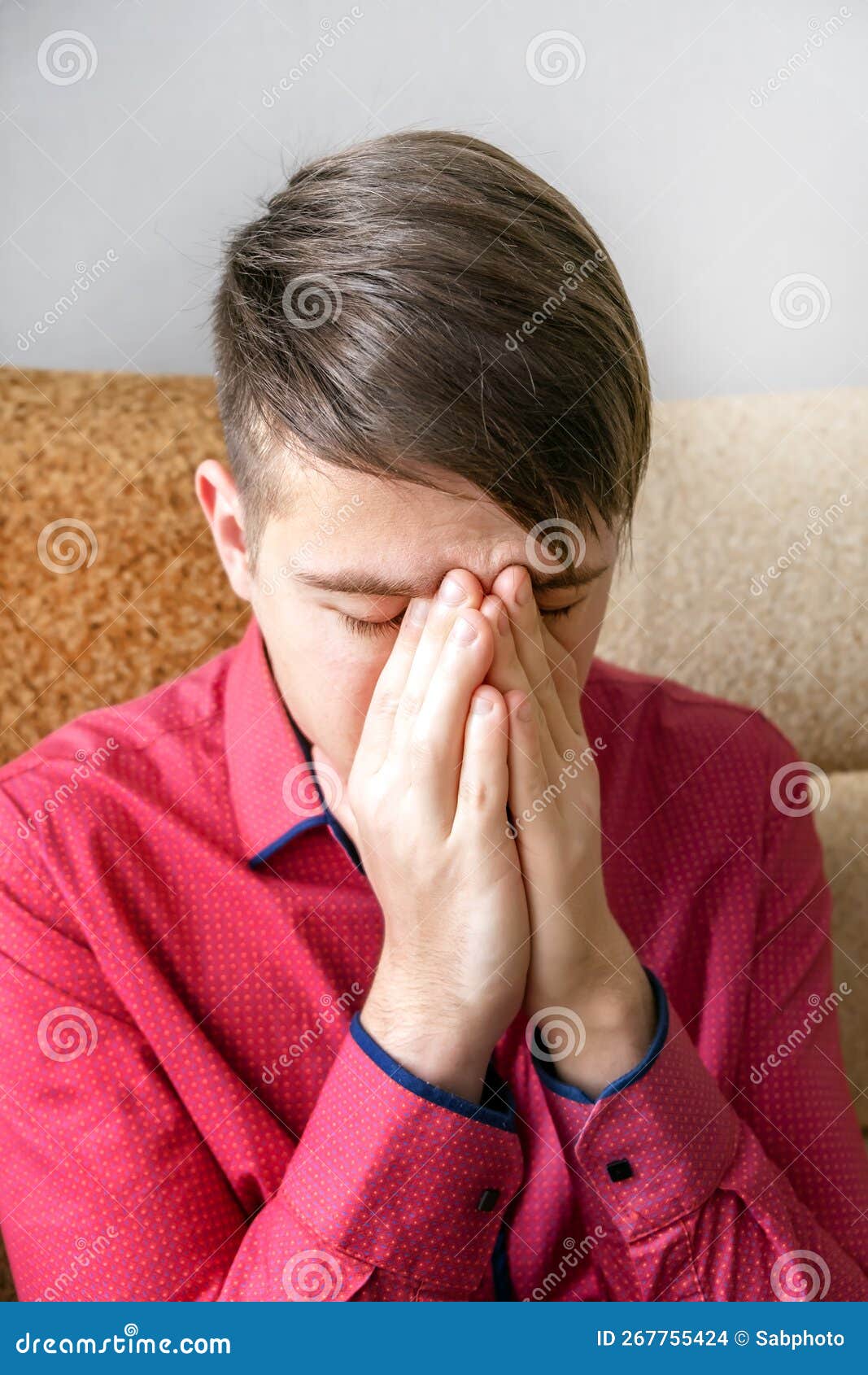 Sad Young Man is Crying stock photo. Image of emotional - 267755424