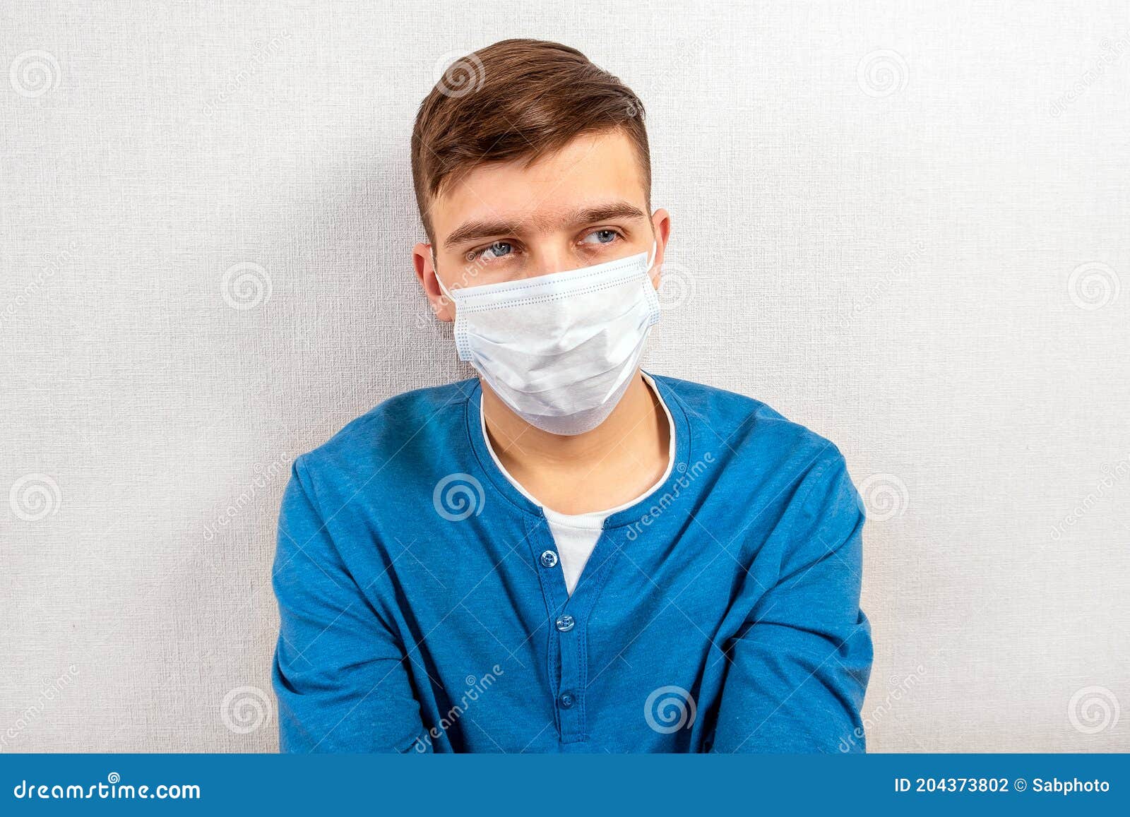 Sad Young Man in Flu Mask stock photo. Image of breather - 204373802