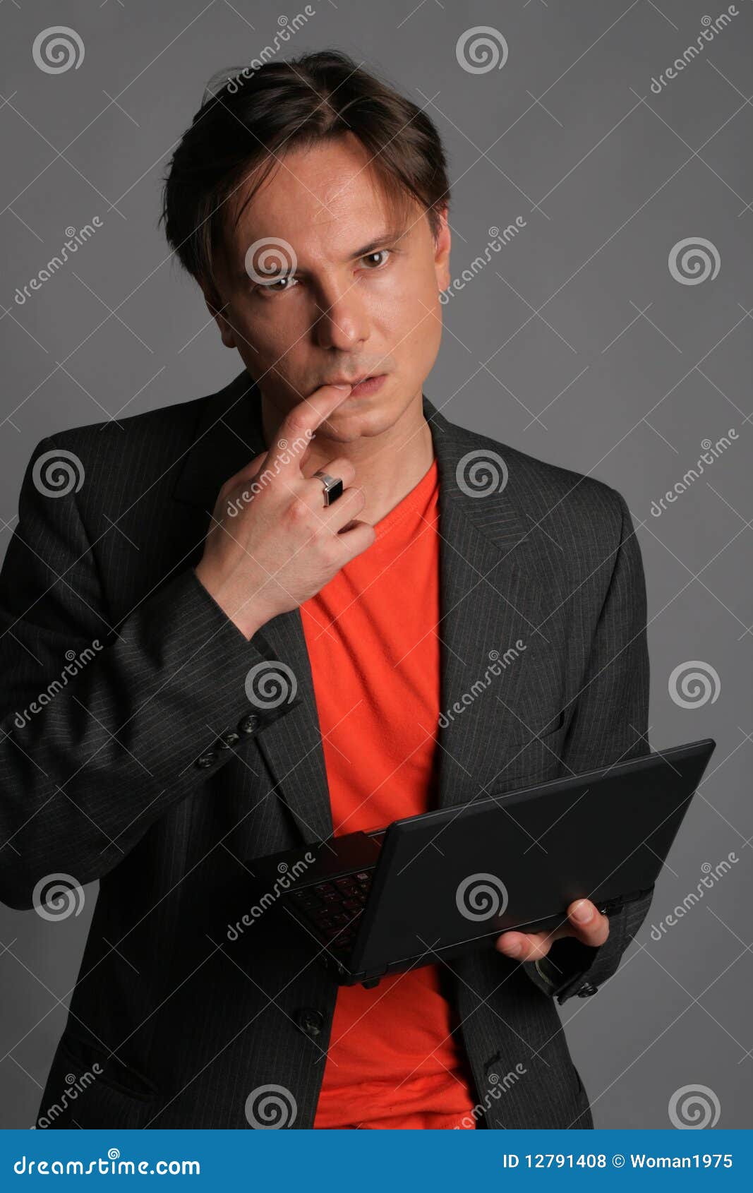 Sad young man with laptop stock photo. Image of professional - 12791408