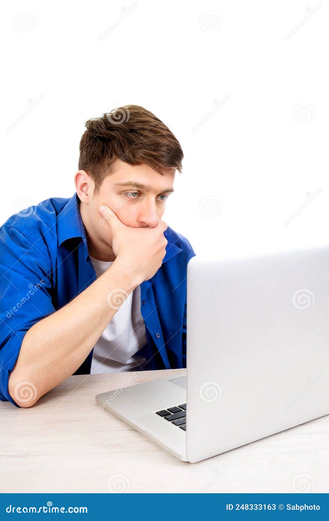 Sad Young Man with Laptop stock image. Image of education - 248333163
