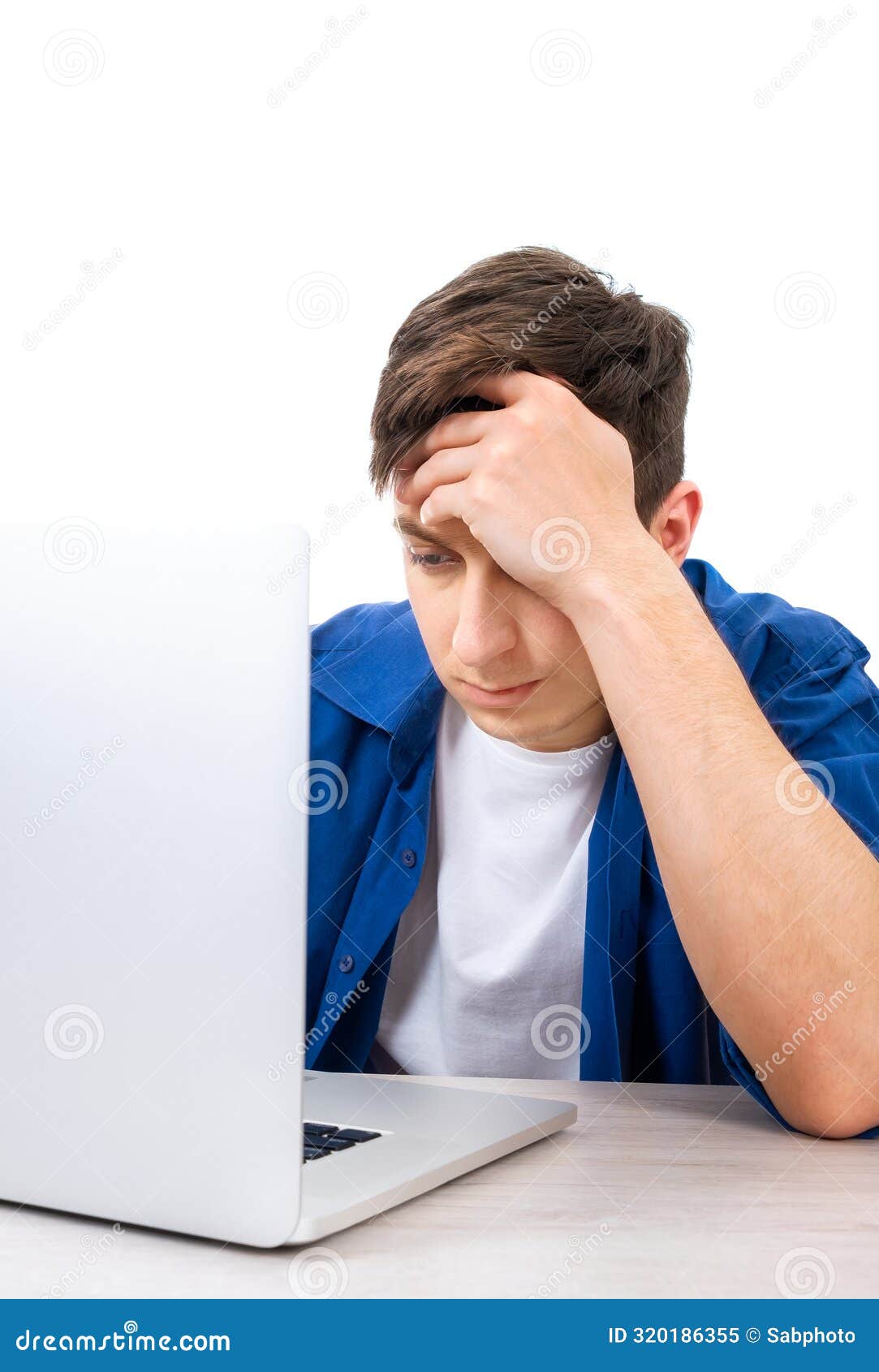 Sad Young Man with Laptop stock image. Image of internet - 320186355