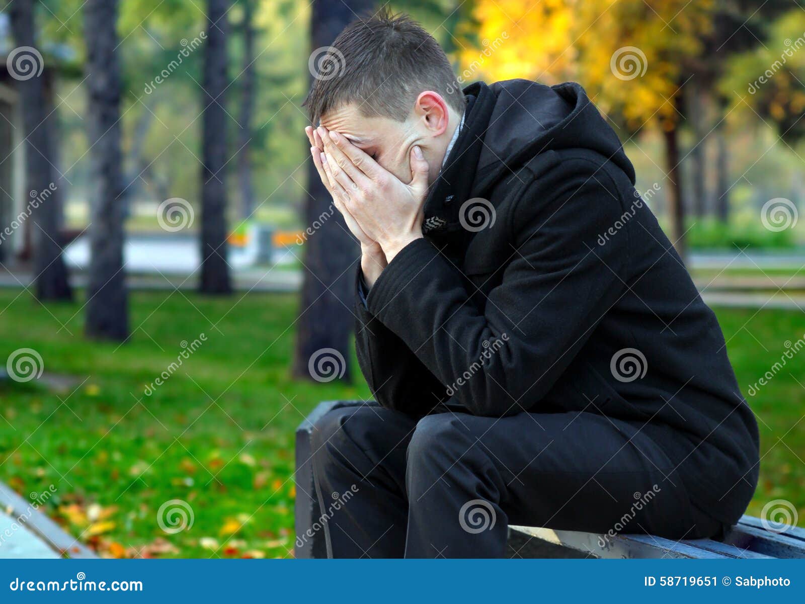 Sad Young Man outdoor stock image. Image of autumn, caucasian - 58719651