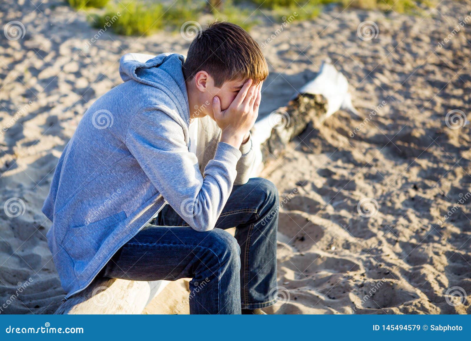 Sad Young Man outdoor stock image. Image of closeup - 145494579