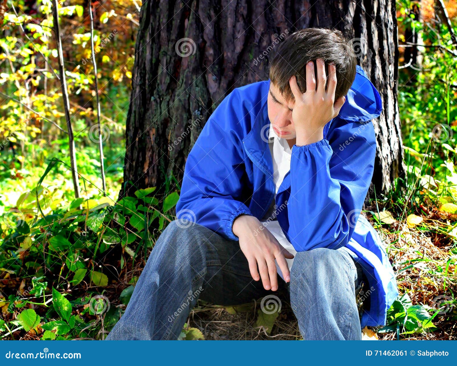 Sad Young Man outdoor stock image. Image of melancholy - 71462061