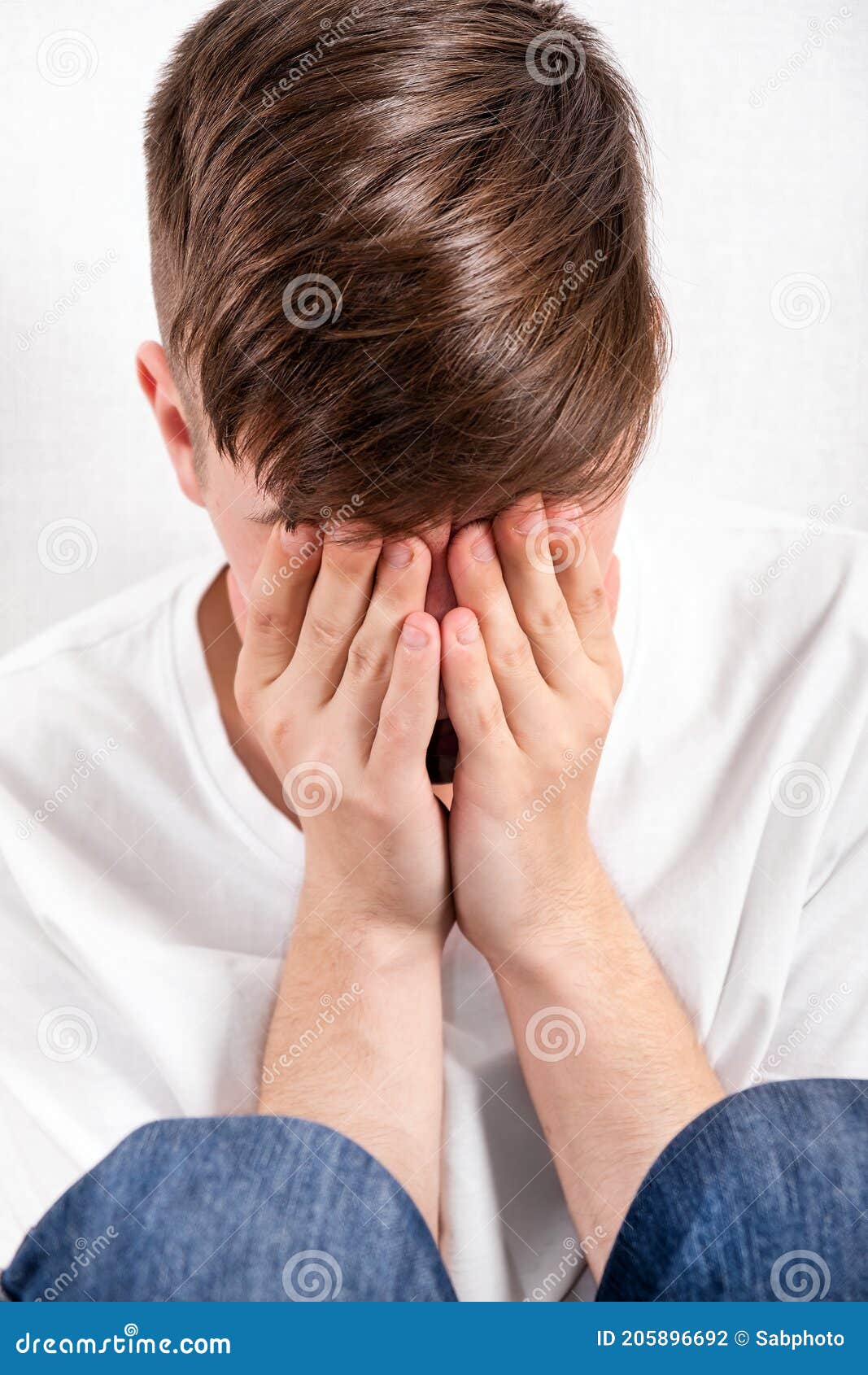Sad Young Man stock photo. Image of grieved, head, cheerless - 205896692