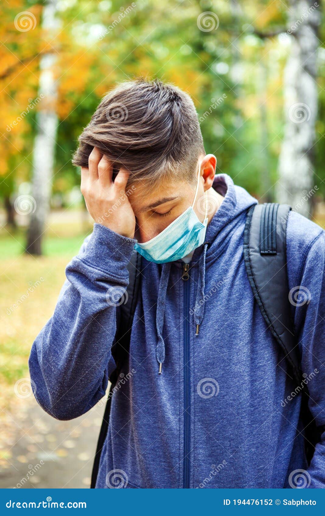 Sad Young Man stock photo. Image of forest, mask, headache - 194476152