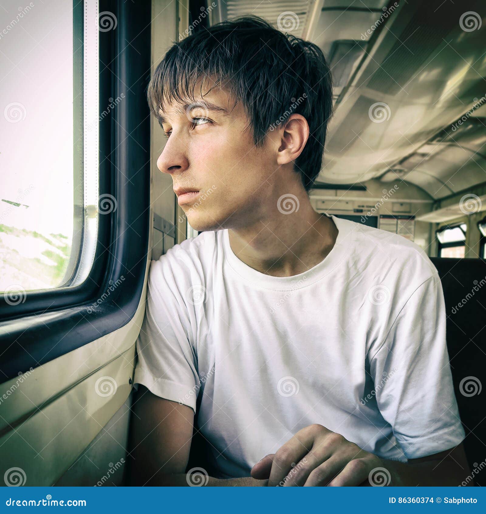 Sad Young Man in the Train stock photo. Image of despondent - 86360374