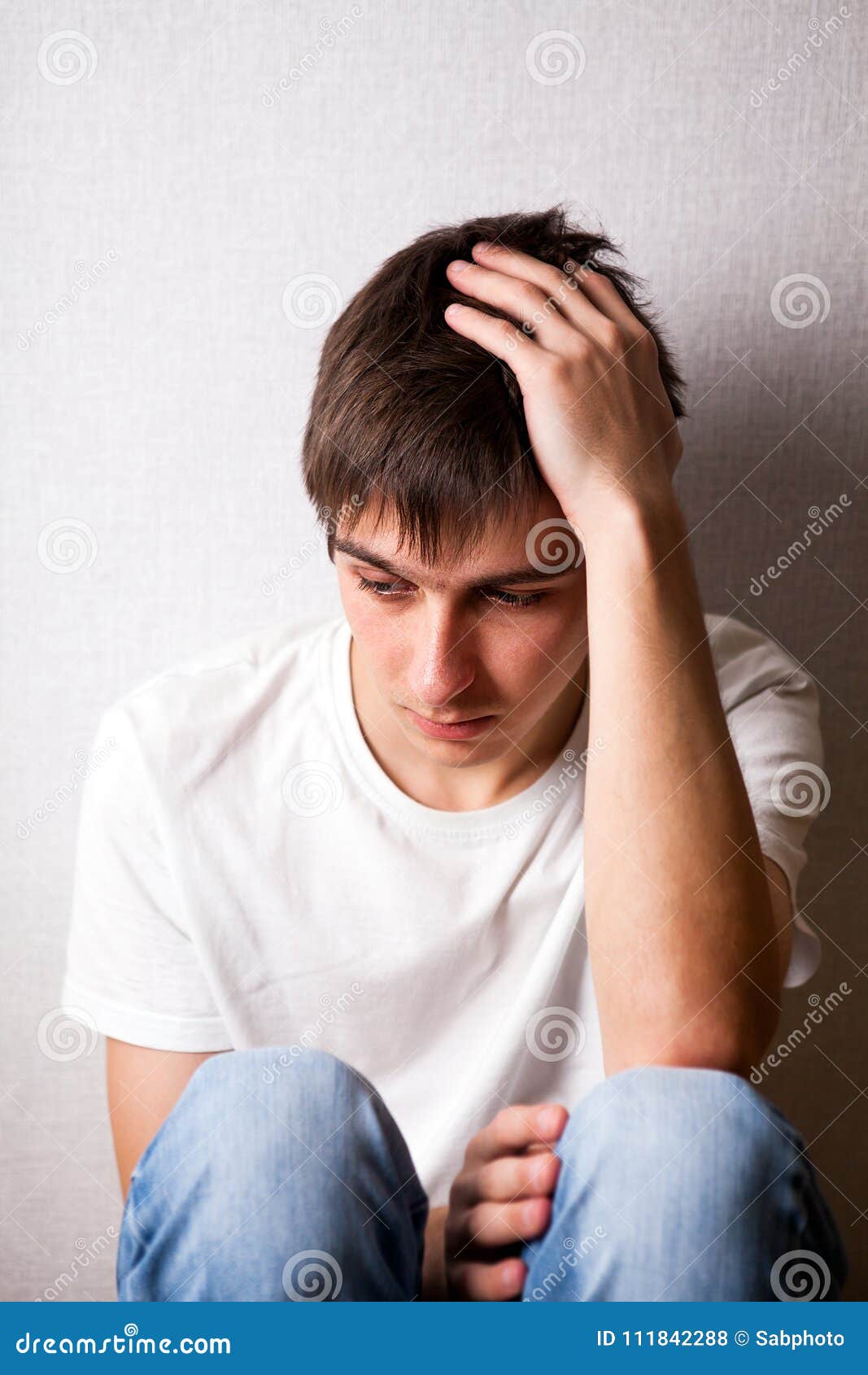 Sad Young Man stock photo. Image of sadness, anxiety - 111842288