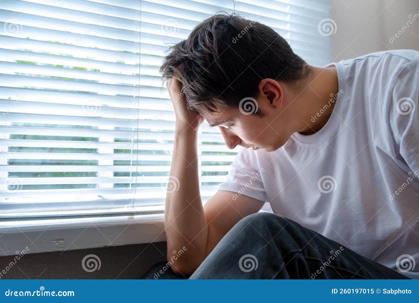 Sad Man near the Window stock image. Image of male, indoor - 260197015