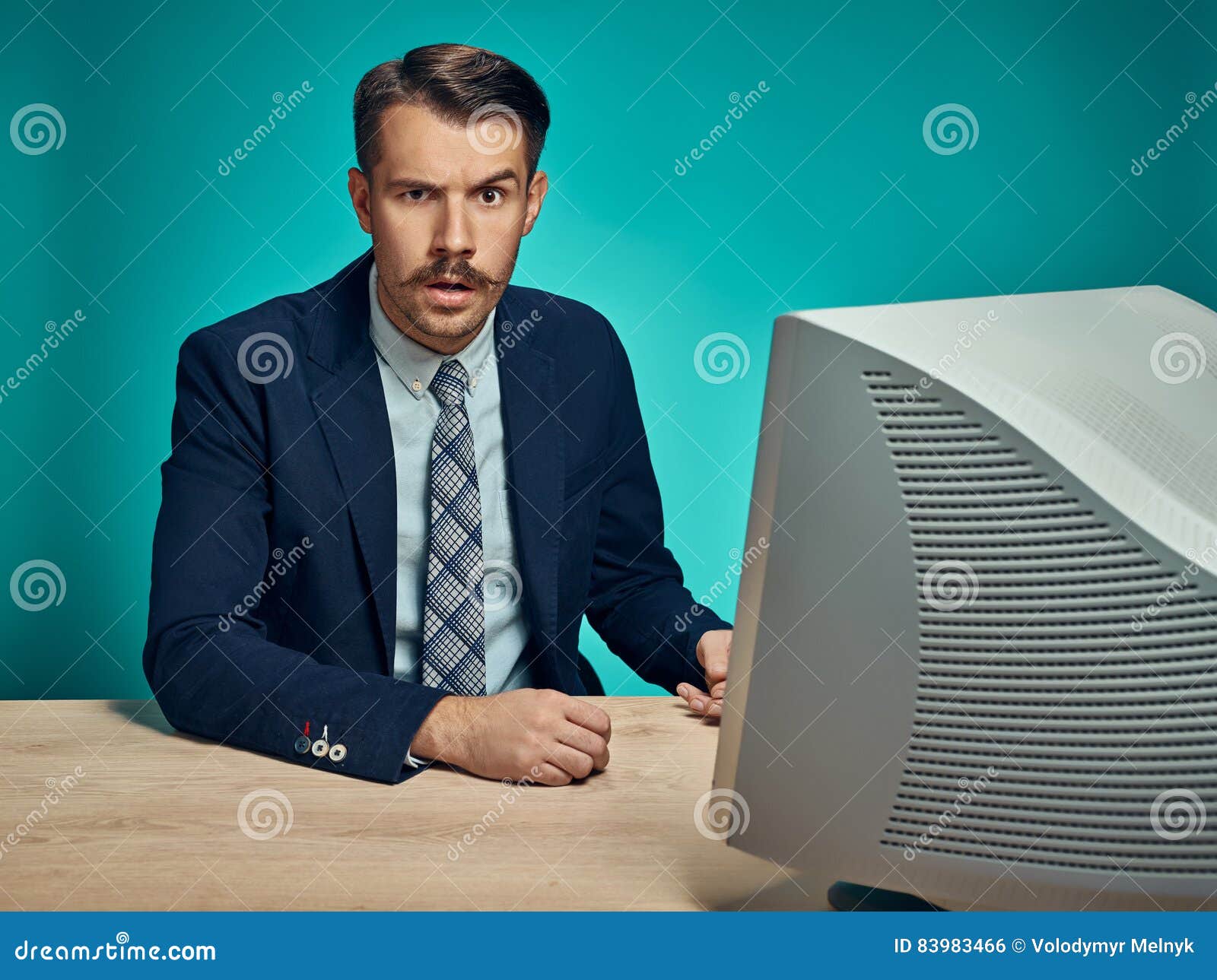 Sad Young Man Working on Computer at Desk Stock Photo - Image of adult ...