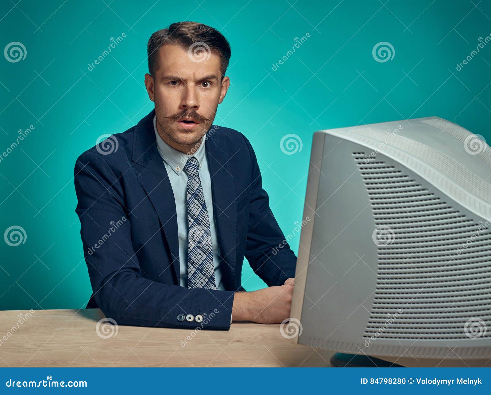 Sad Young Man Working on Computer at Desk Stock Photo - Image of ...