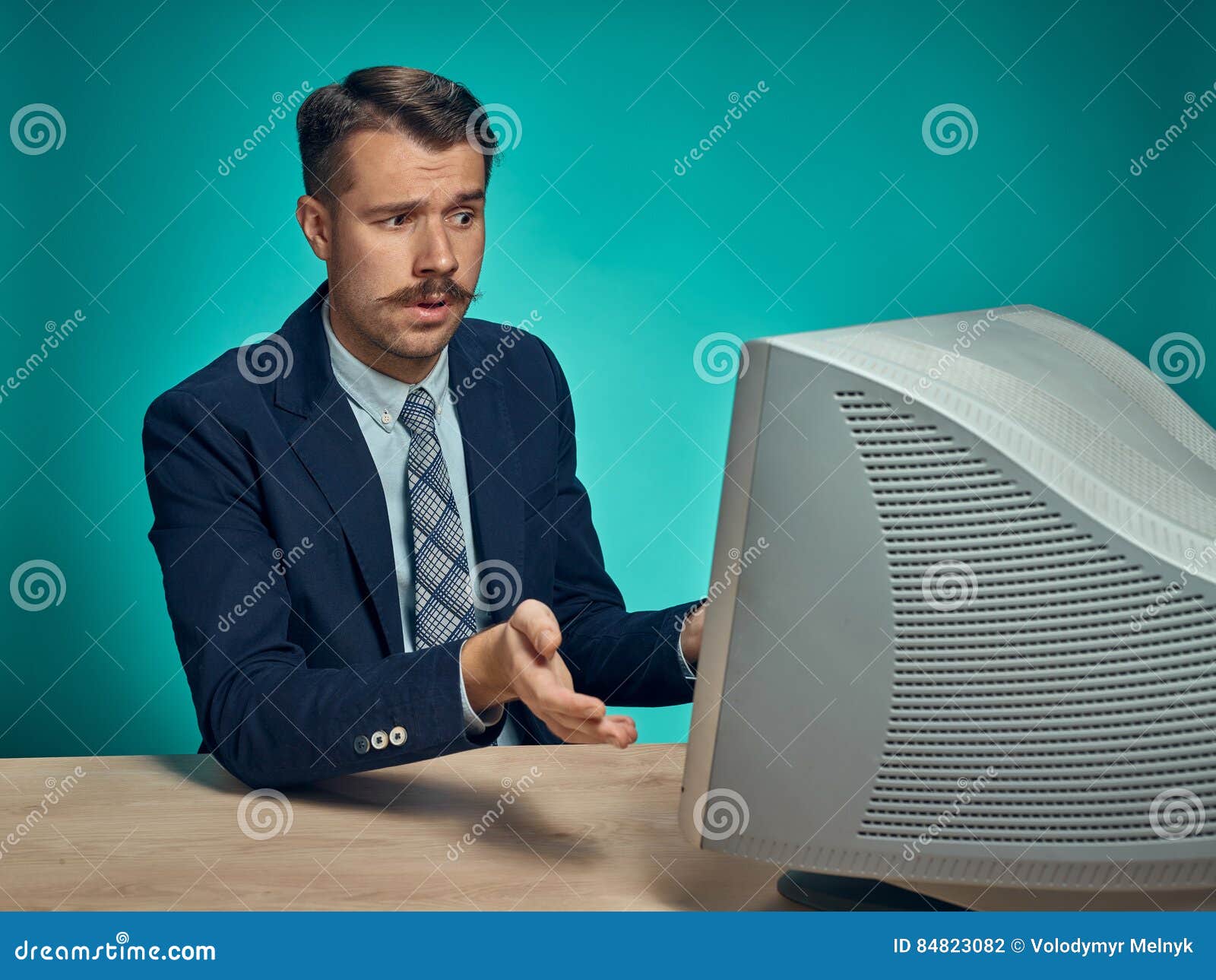 Sad Young Man Working on Computer at Desk Stock Photo - Image of adult ...