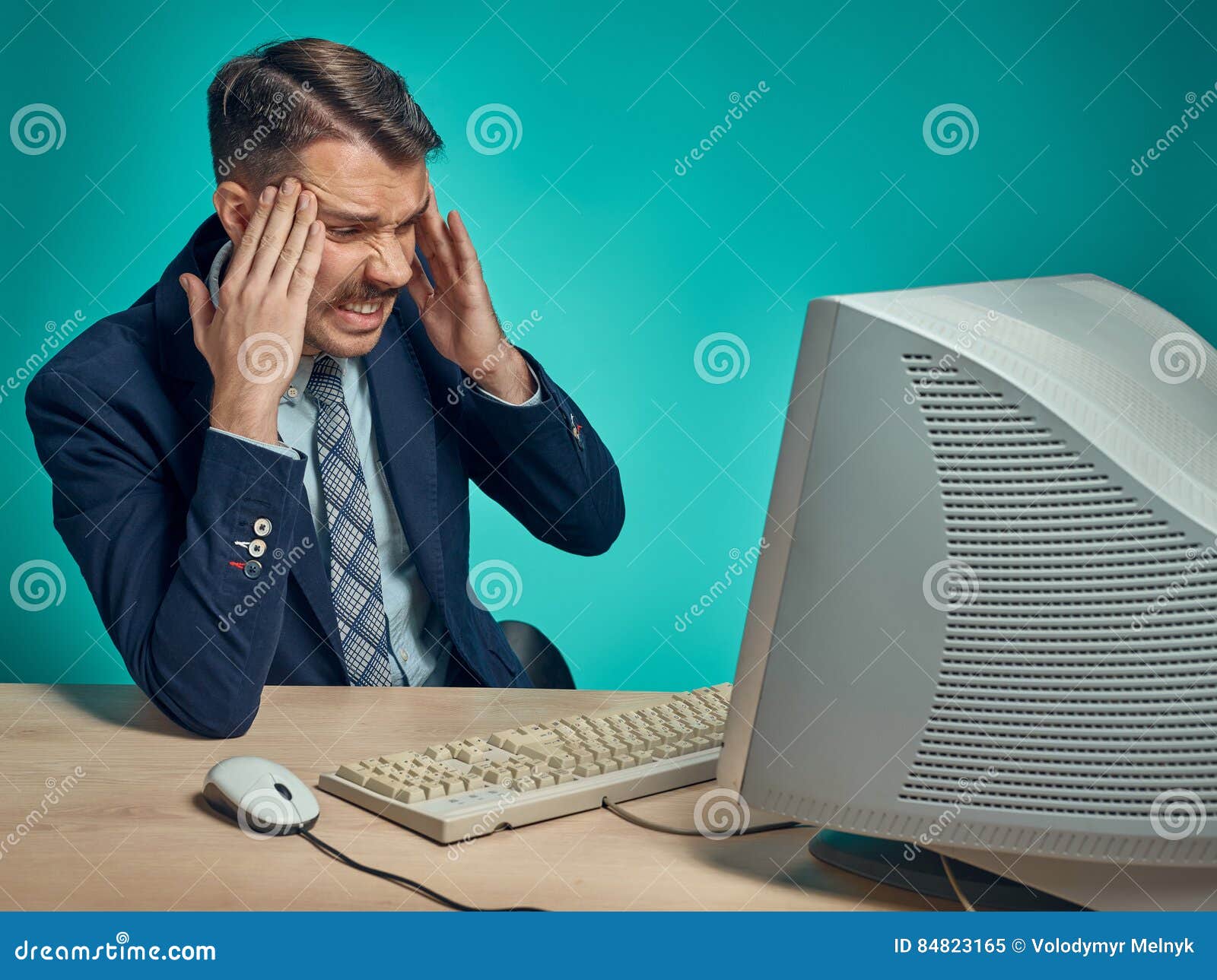 Sad Young Man Working on Computer at Desk Stock Image - Image of ...