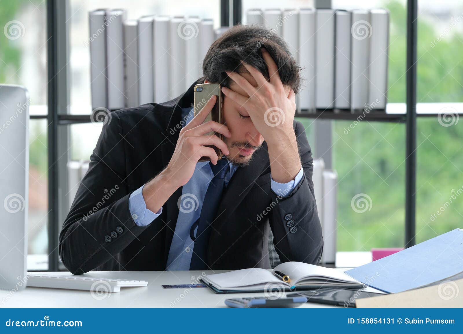 Sad Young Man Working on Laptop in Office Stock Image - Image of adult ...