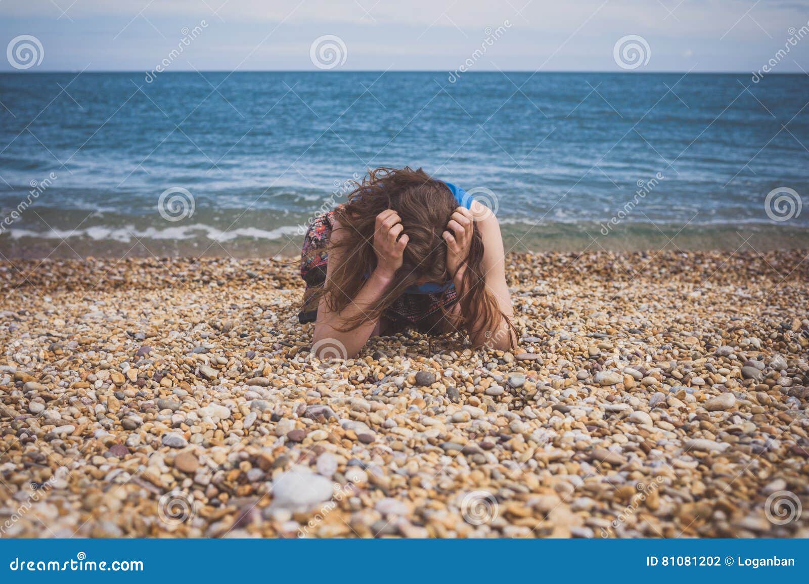 Sad Young Woman on the Beach Stock Photo - Image of resting, sorrow ...