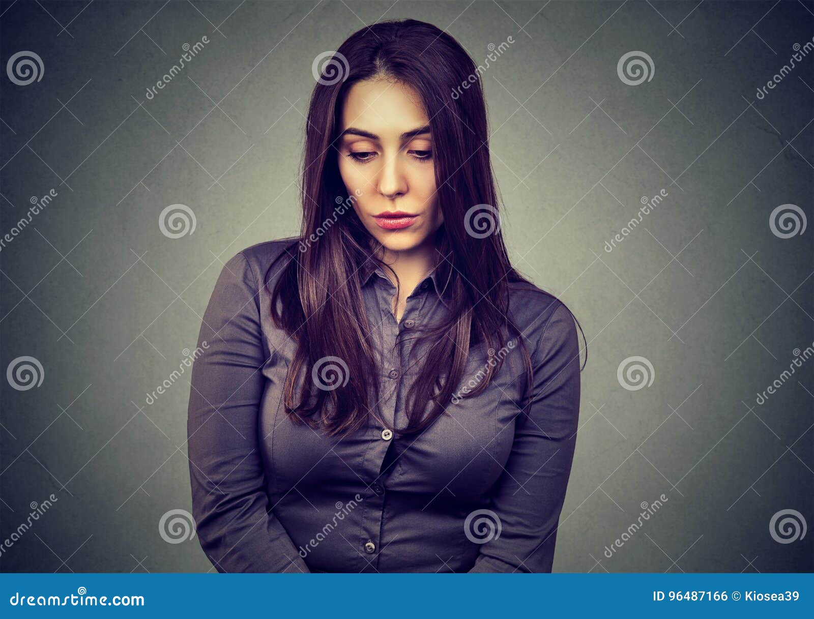 Sad Young Woman Looking Down Stock Photo - Image of background ...