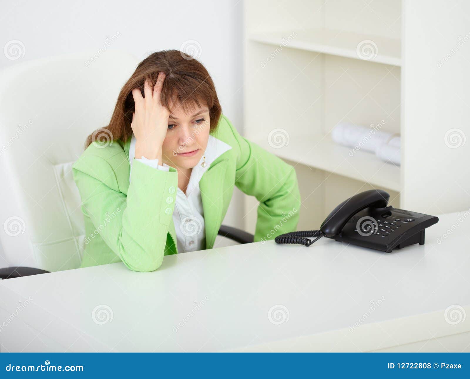 A Sad Young Woman in Office at Workplace Stock Photo - Image of ...