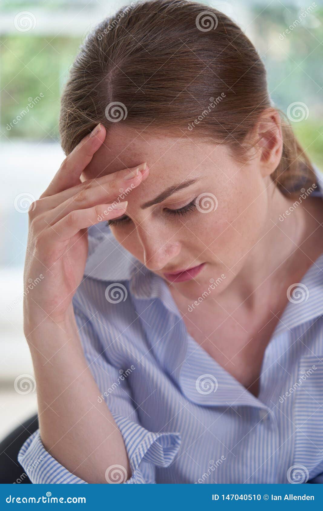 Sad Young Woman Suffering from Depression with Head in Hands Stock ...