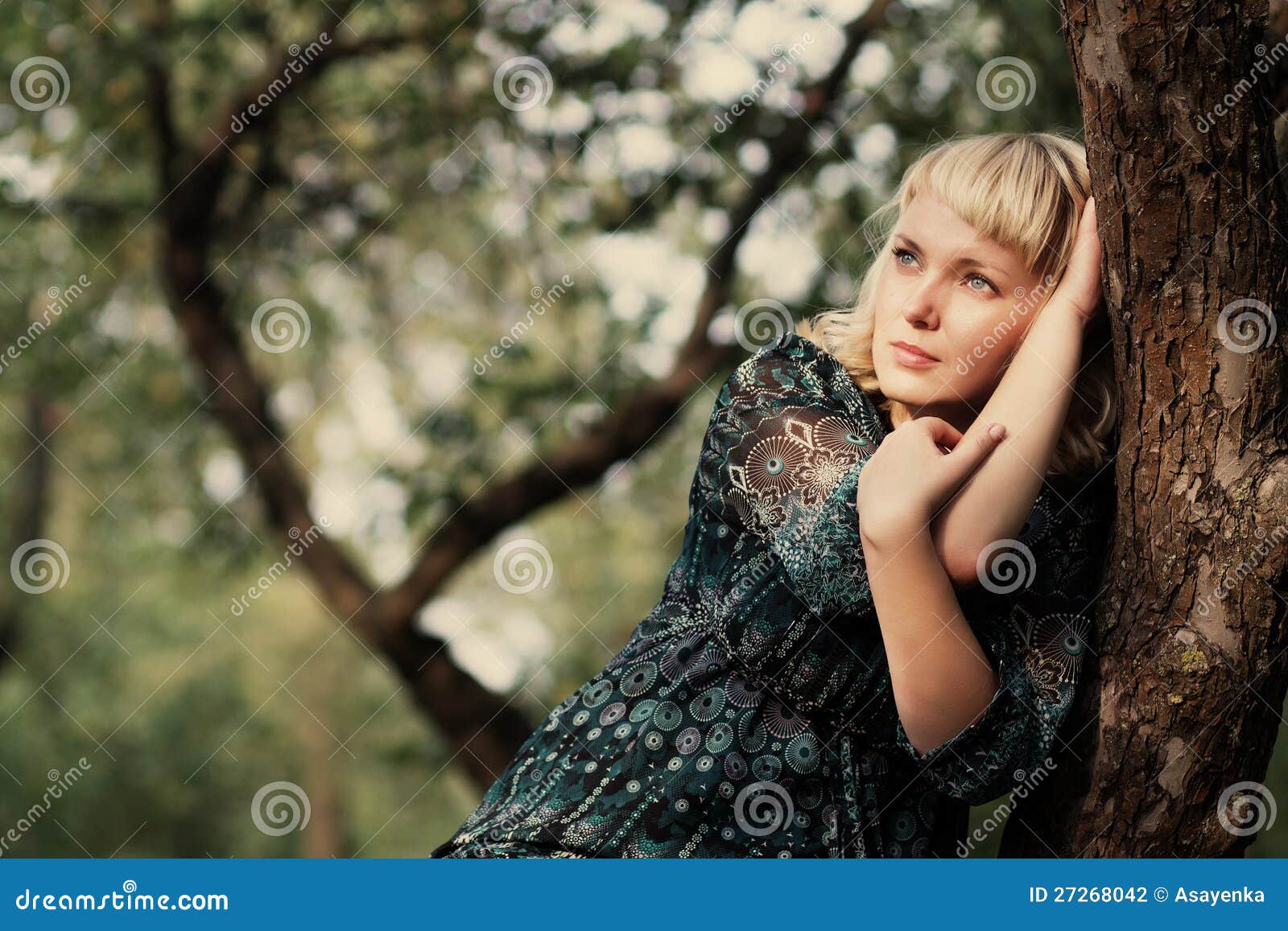 Sadness Girl is on a Tree Branch Stock Photo - Image of blond, sitting ...