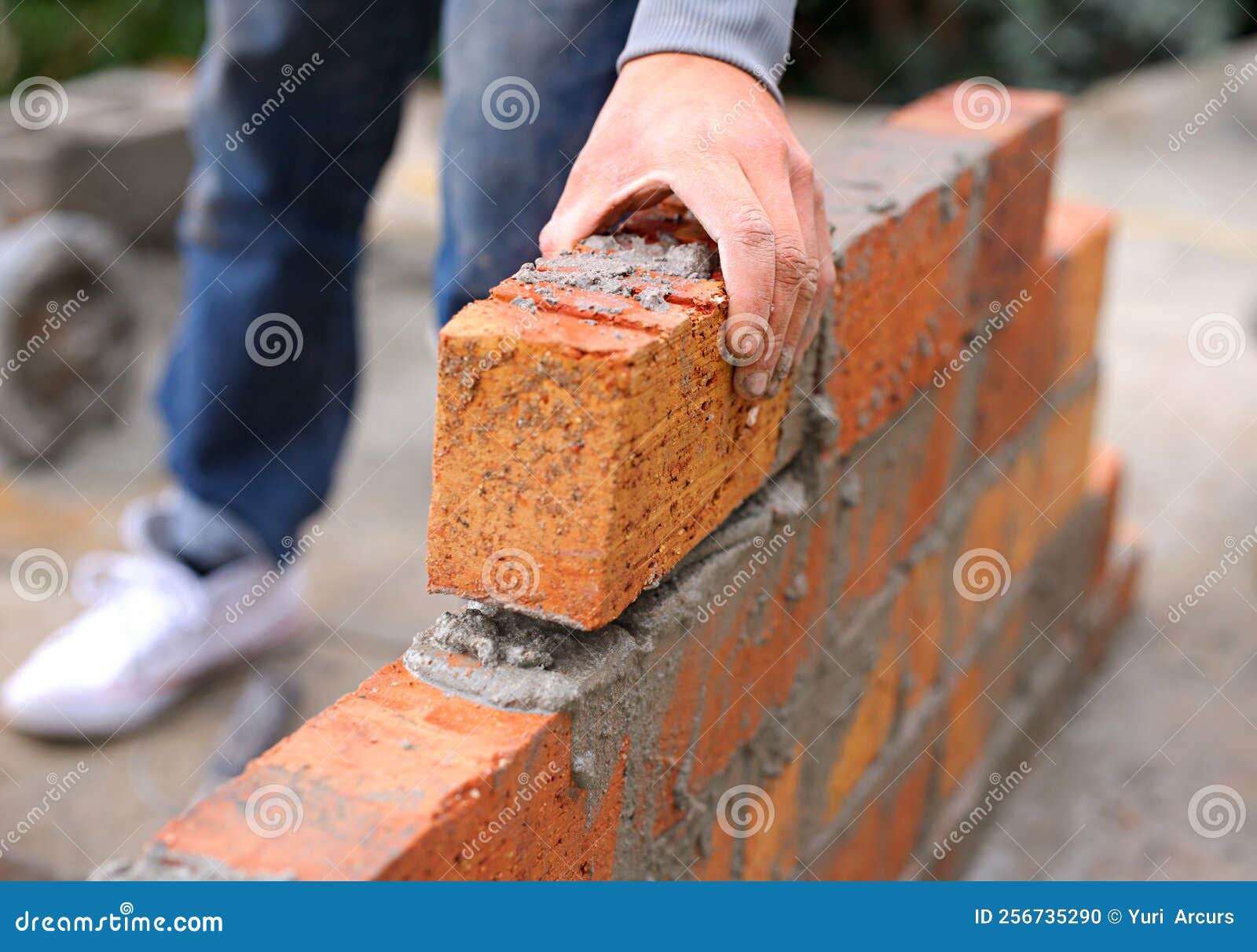 Safe As Bricks and Mortar. a Master Bricklayer at Work. Stock Photo ...