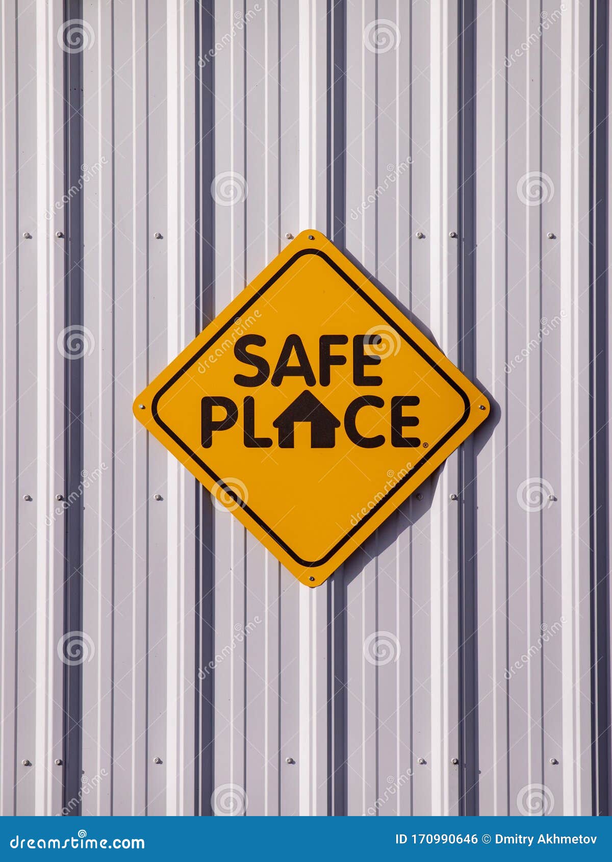 Yellow `Safe Place` Sign of a Light Metal Wall Stock Photo - Image of ...