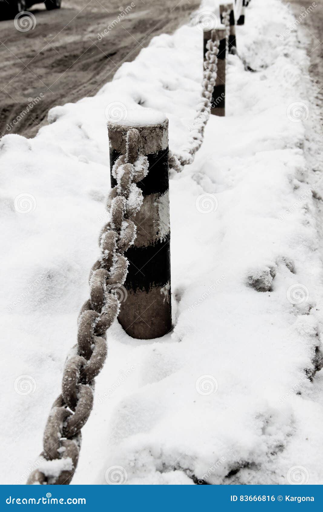 Safety Bollards with Chains Covered with Snow and Ice Stock Photo ...