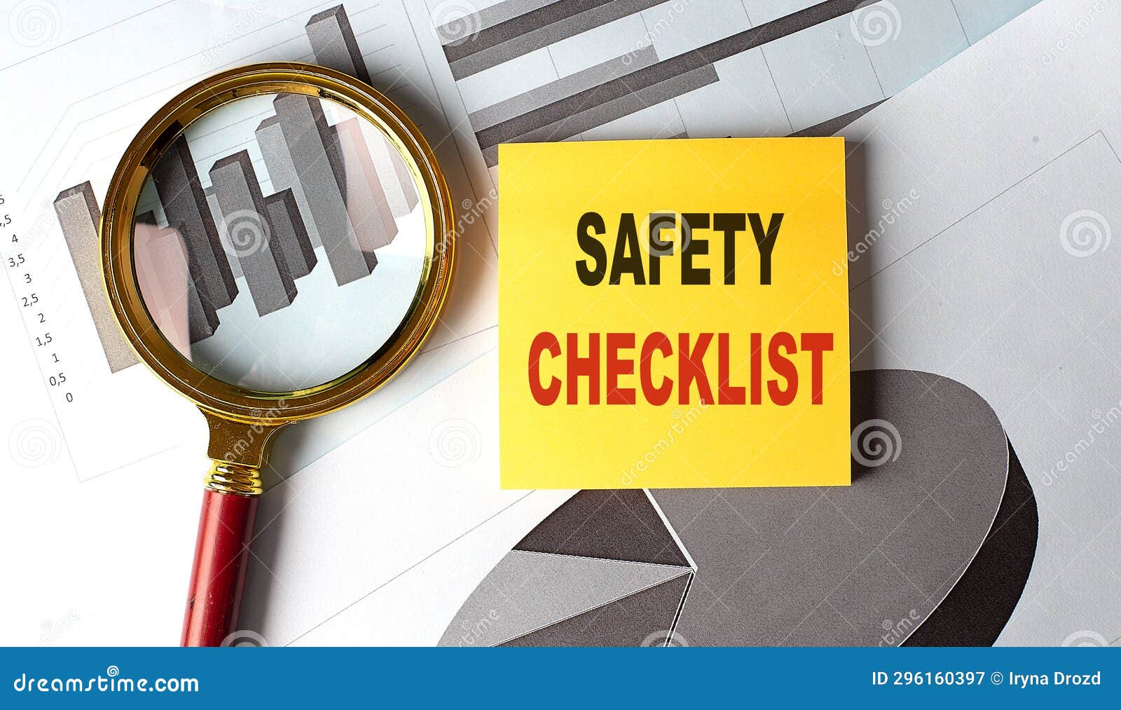 SAFETY CHECKLIST Text on a Sticky on Red Notebook on Chart Background ...