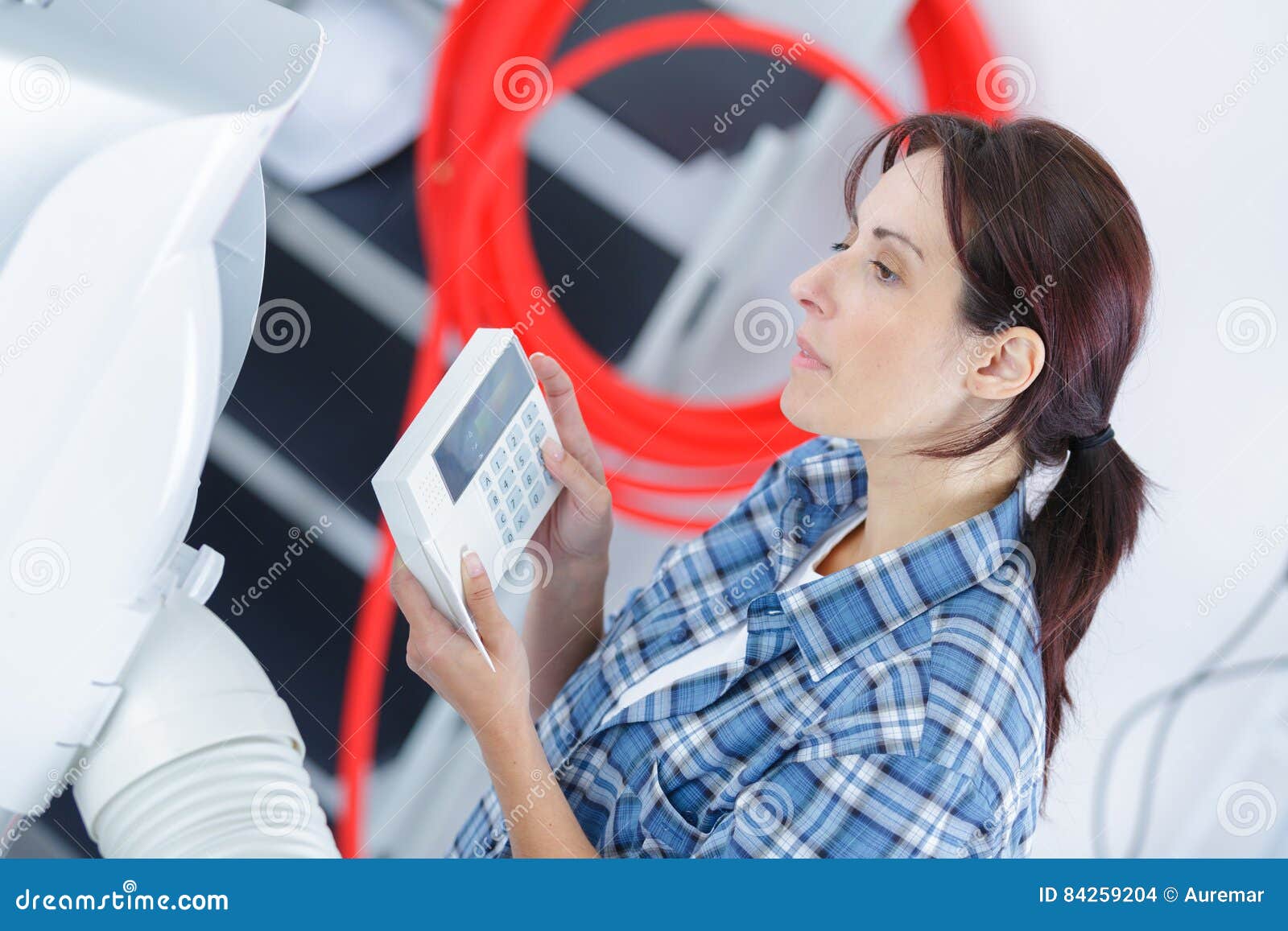 Safety Conscious Woman Fitting Alarm Stock Photo - Image of interior ...