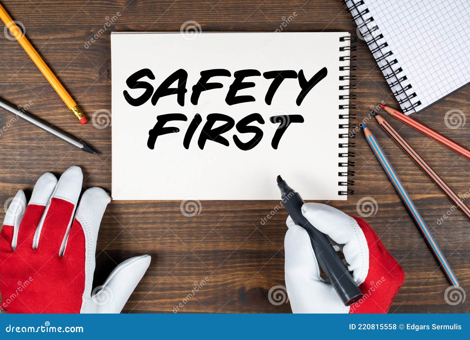 Safety First. Notebook and Office Supplies on Wood Background Stock ...