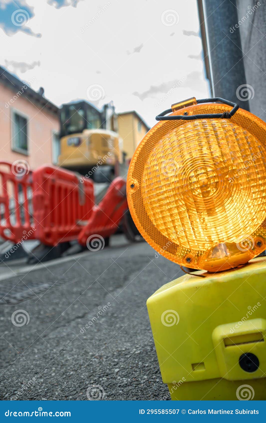 Safety Lantern on Construction Work with Red Barriers and Excavator ...