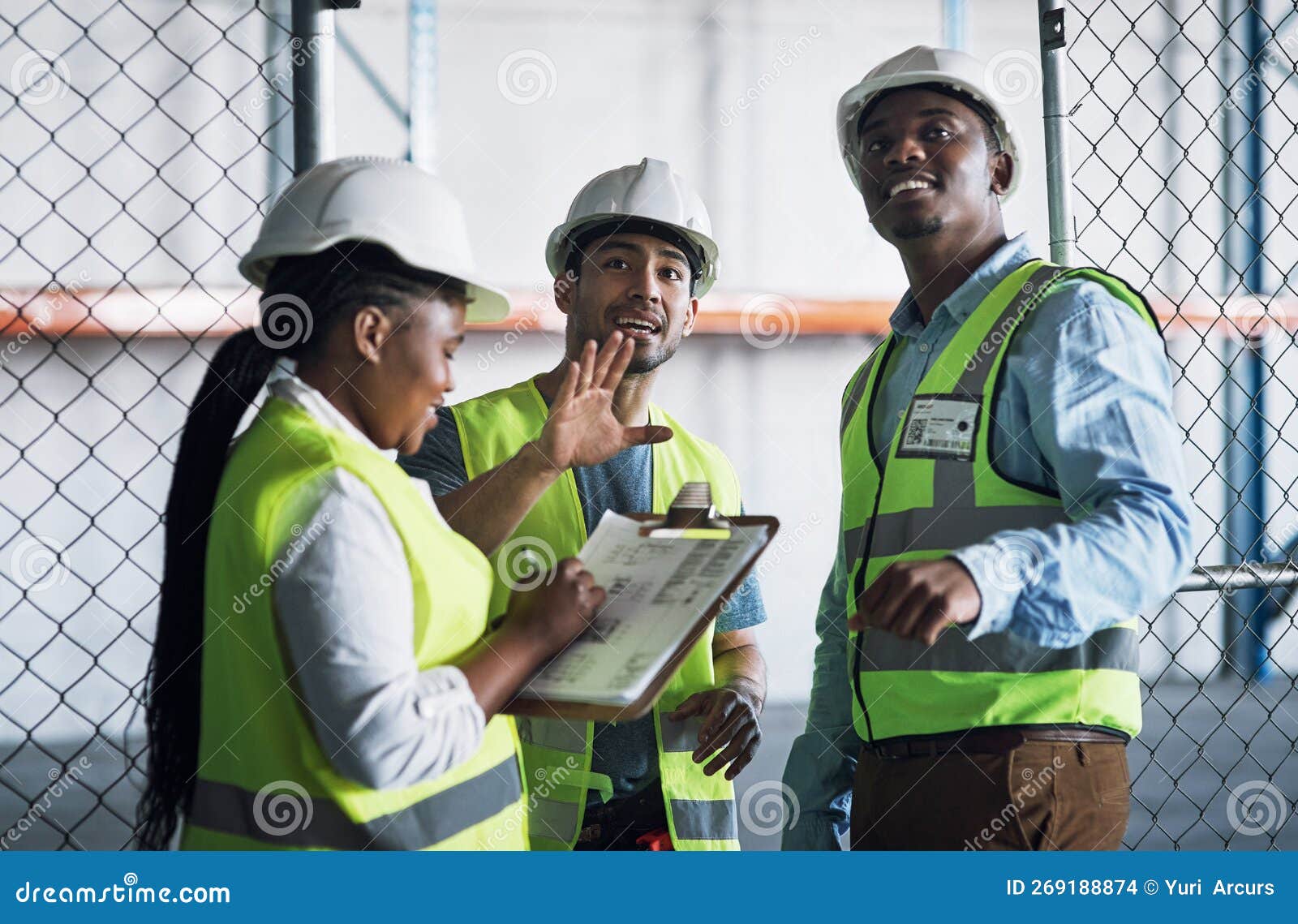 Safety always Makes Better Sense. a Group of Builders Inspecting a ...