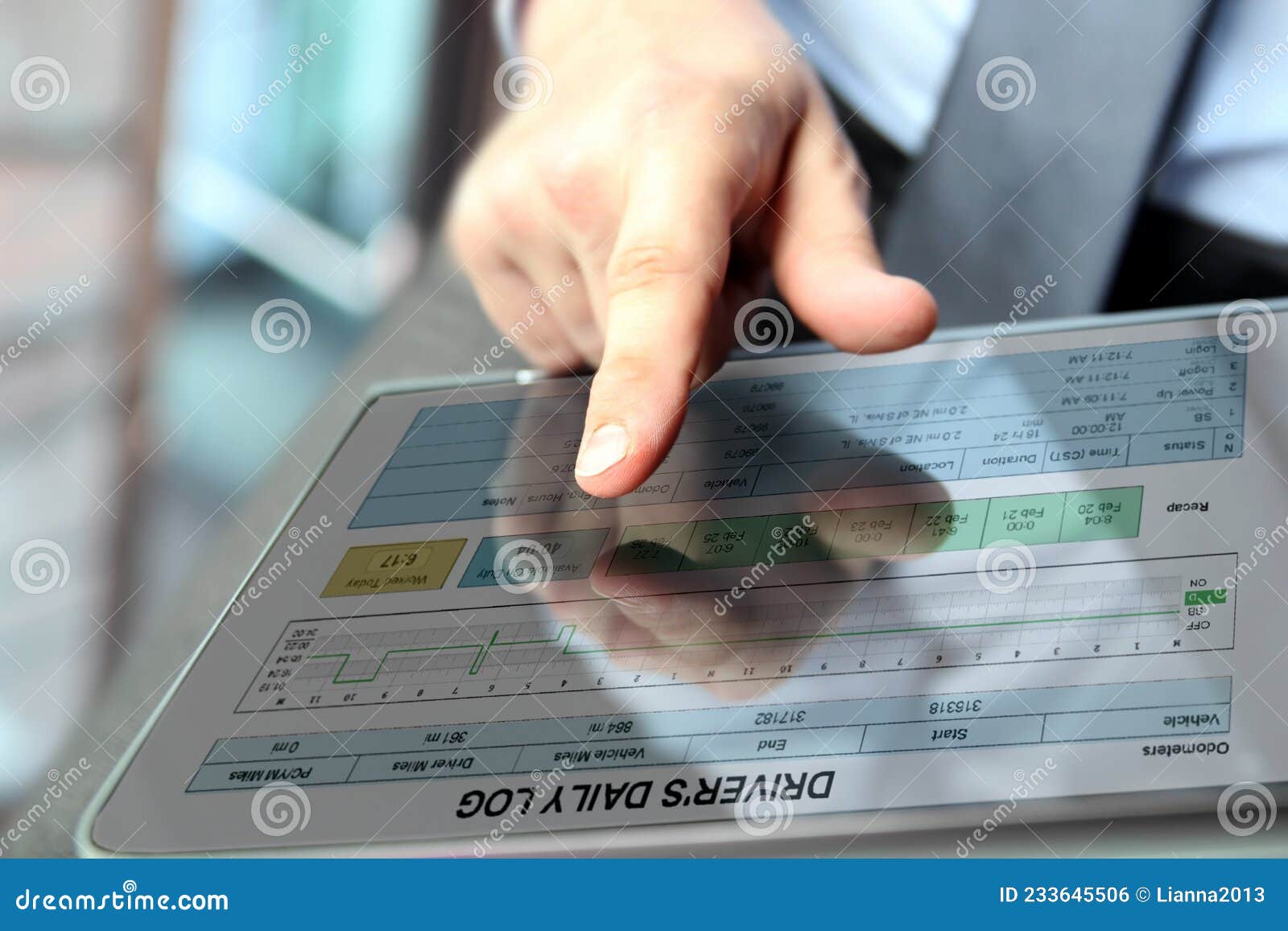 Safety Manager is is Checking Electronic Logbooks on a Tablet Stock ...