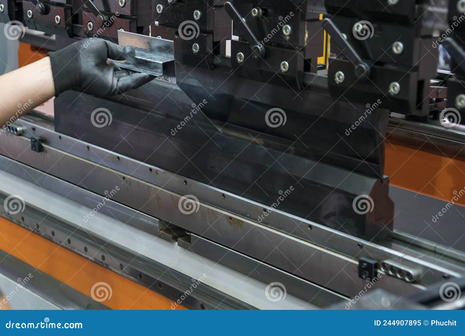 The Safety Operator Working with Hydraulic Press Brake Bending Machine ...