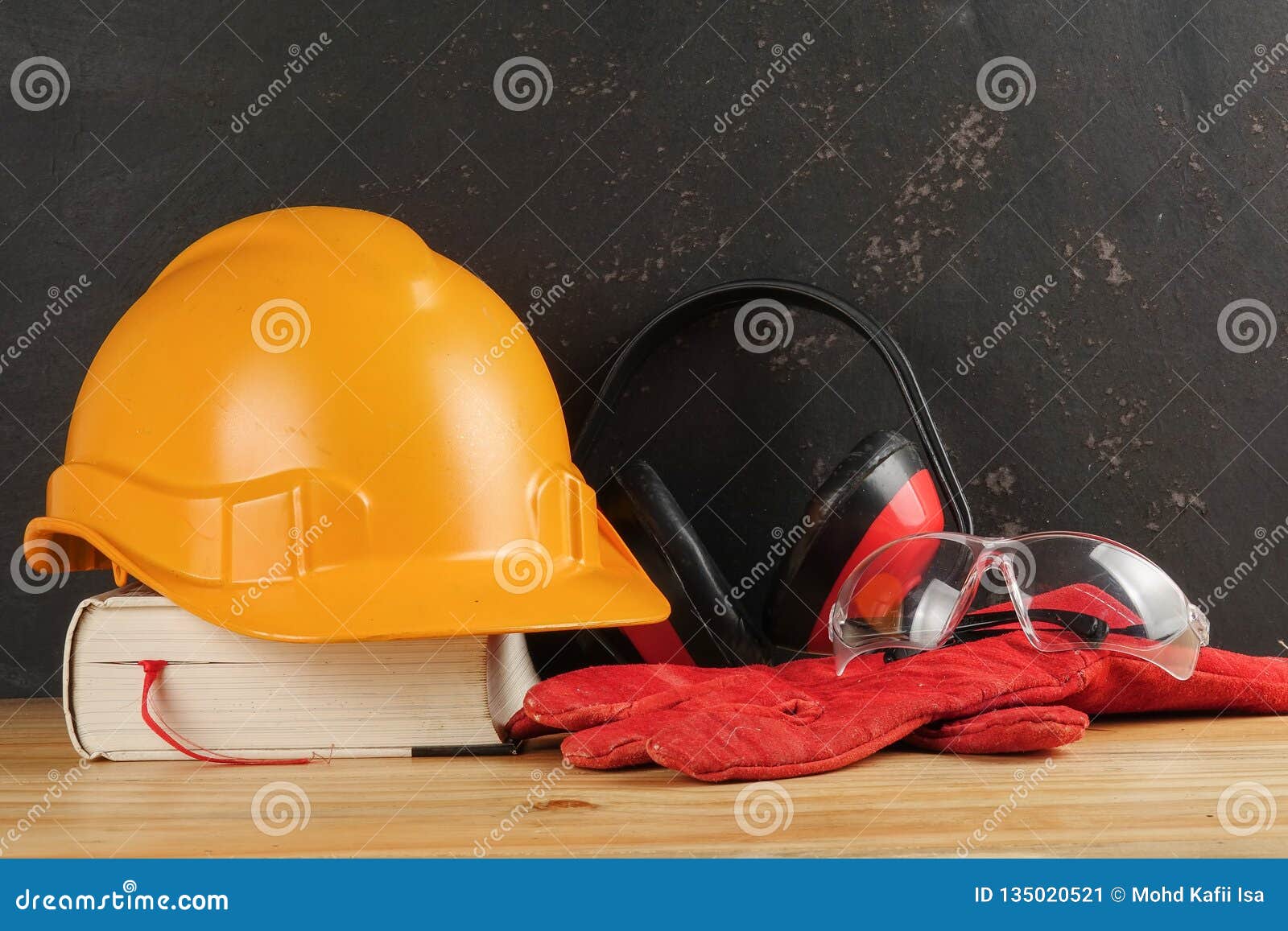 Safety Personal Protective EquipmentPPE on a Rustic Black Background ...