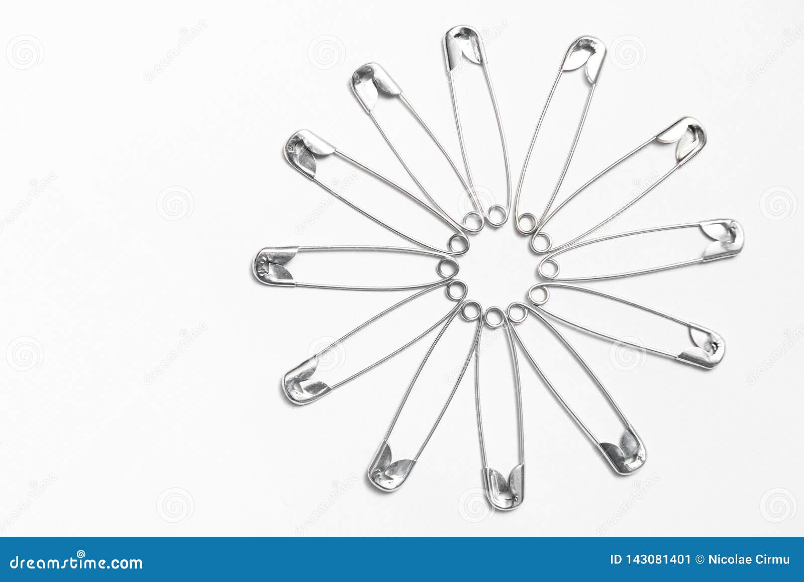Safety pin arrangement stock image. Image of straight - 143081401
