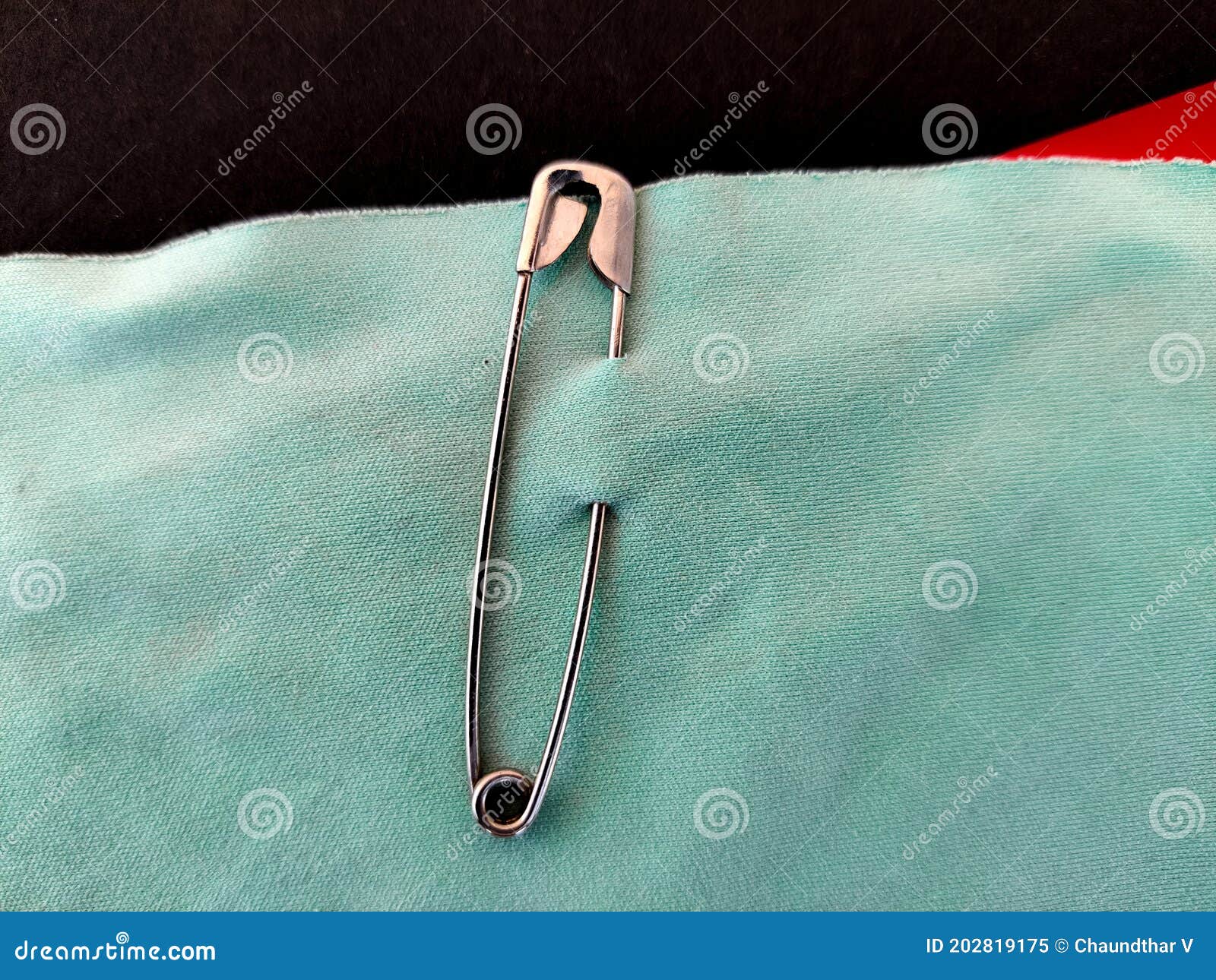 Safety Pin on Green Fabric. Stock Image - Image of handiwork, color ...