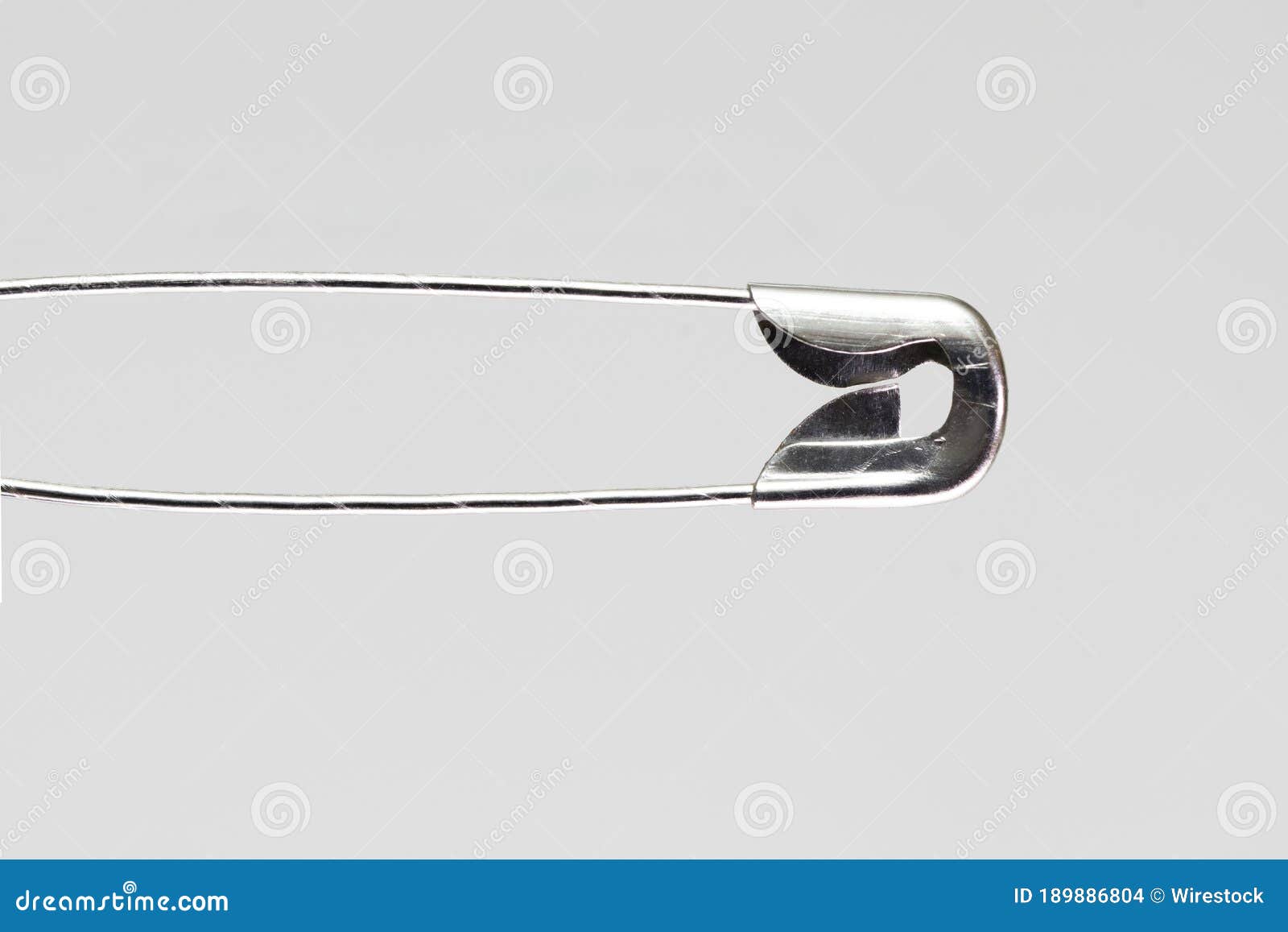 Safety Pin Isolated on a Plain White Background Stock Photo - Image of ...