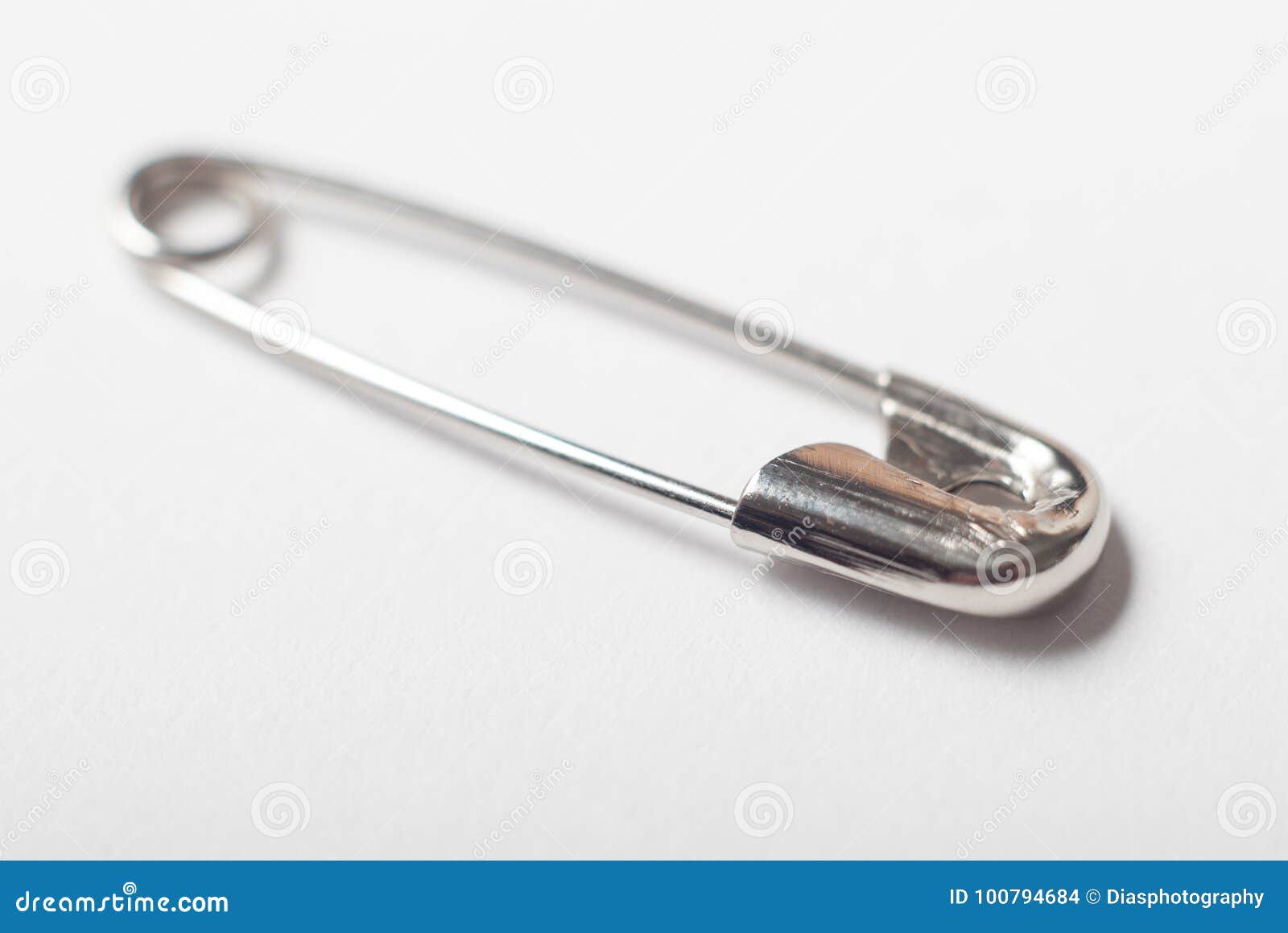 Safety Pin on a White Background Stock Photo - Image of shiny, safety ...
