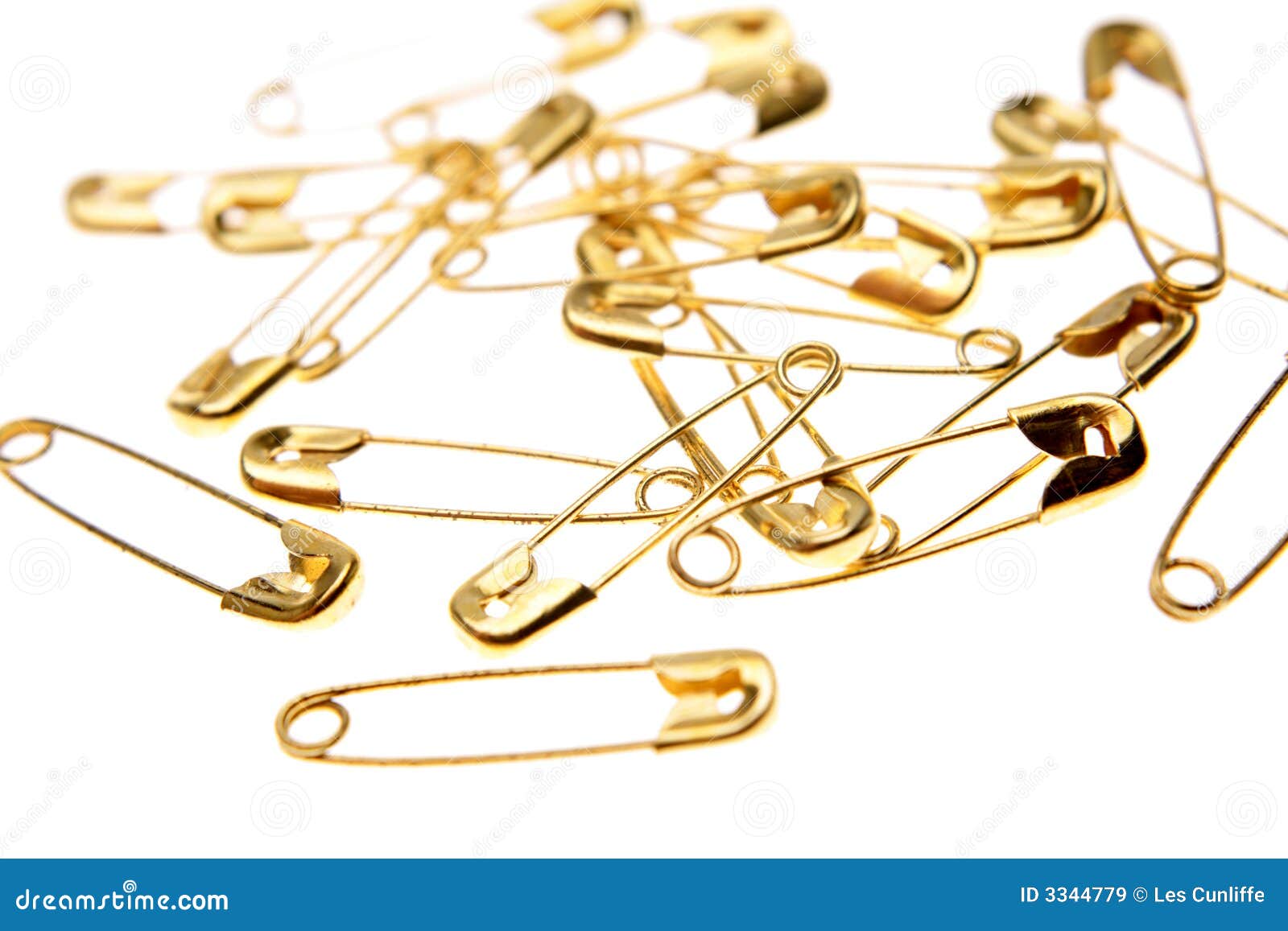 Safety pins stock image. Image of fasteners, objects, golden - 3344779