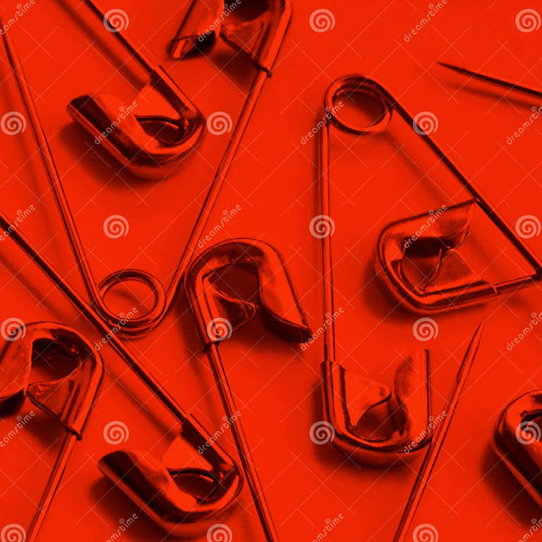 Safety pins in red stock photo. Image of shape, clip, abstract - 58396