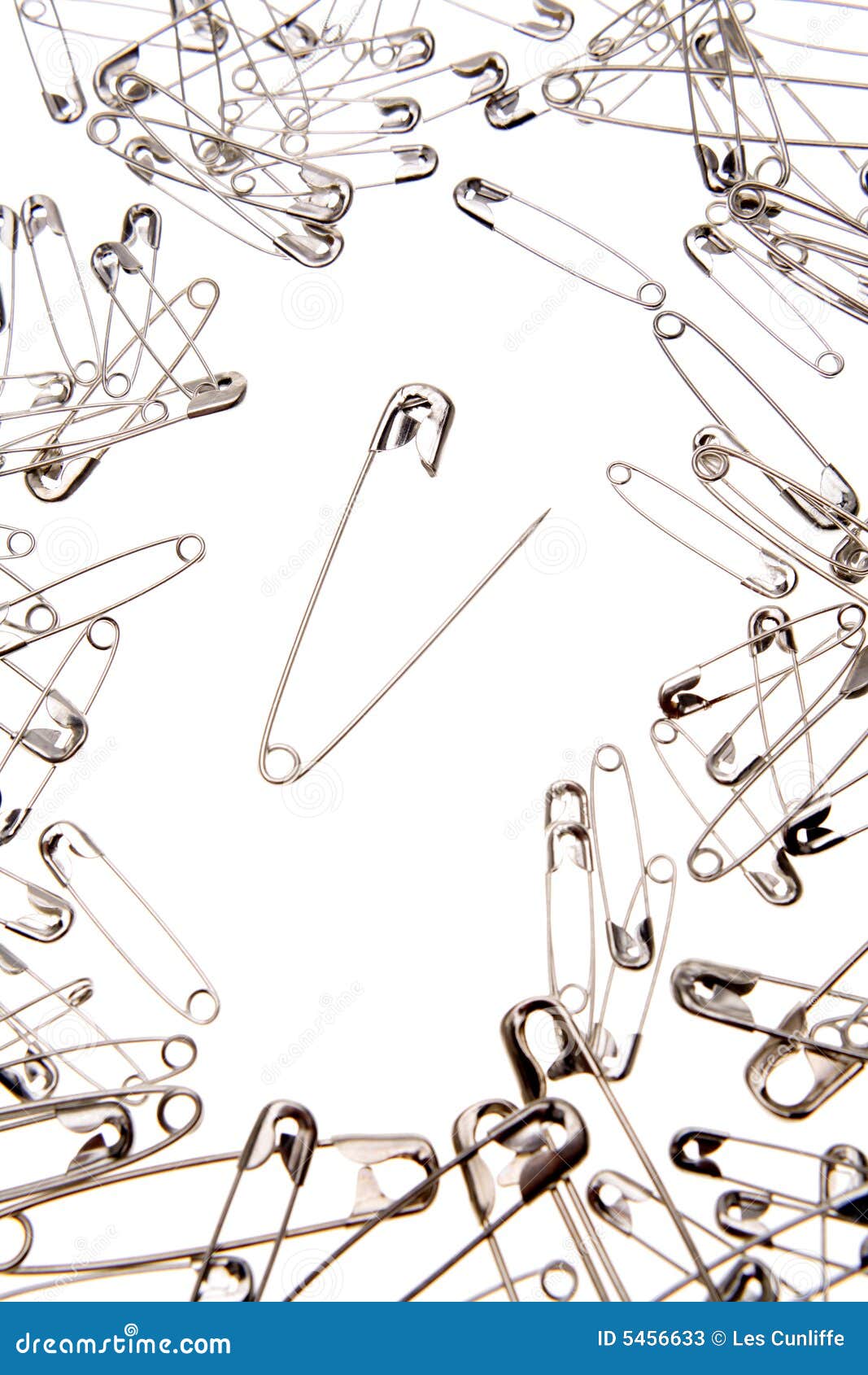 Safety pins on white stock image. Image of open, alone - 5456633
