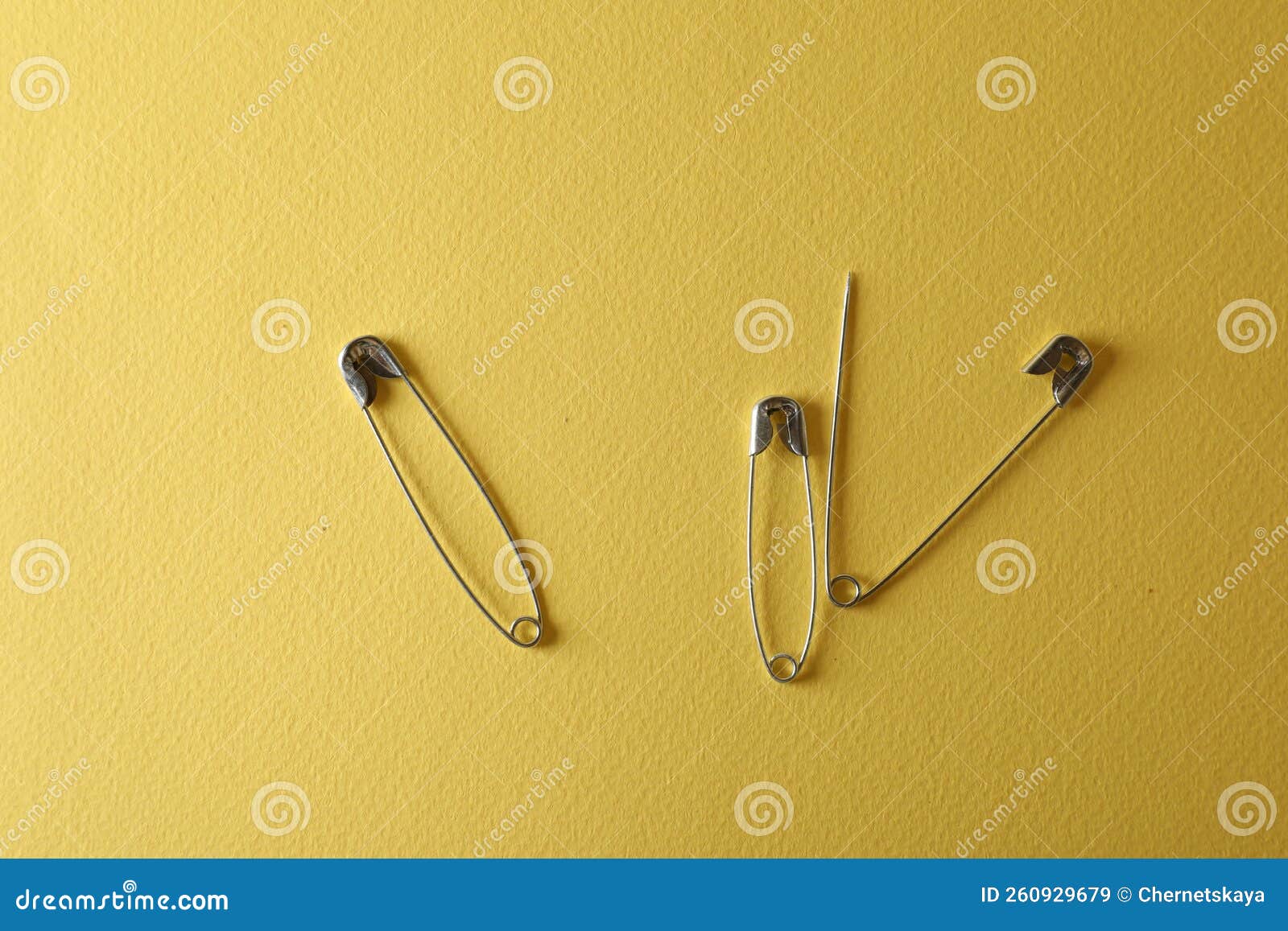 Safety Pins on Yellow Background, Flat Lay Stock Image - Image of view ...