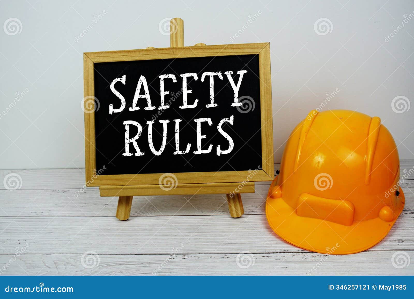 Safety Rules Text on Blackboard with Safety Helmet on Wooden Background ...