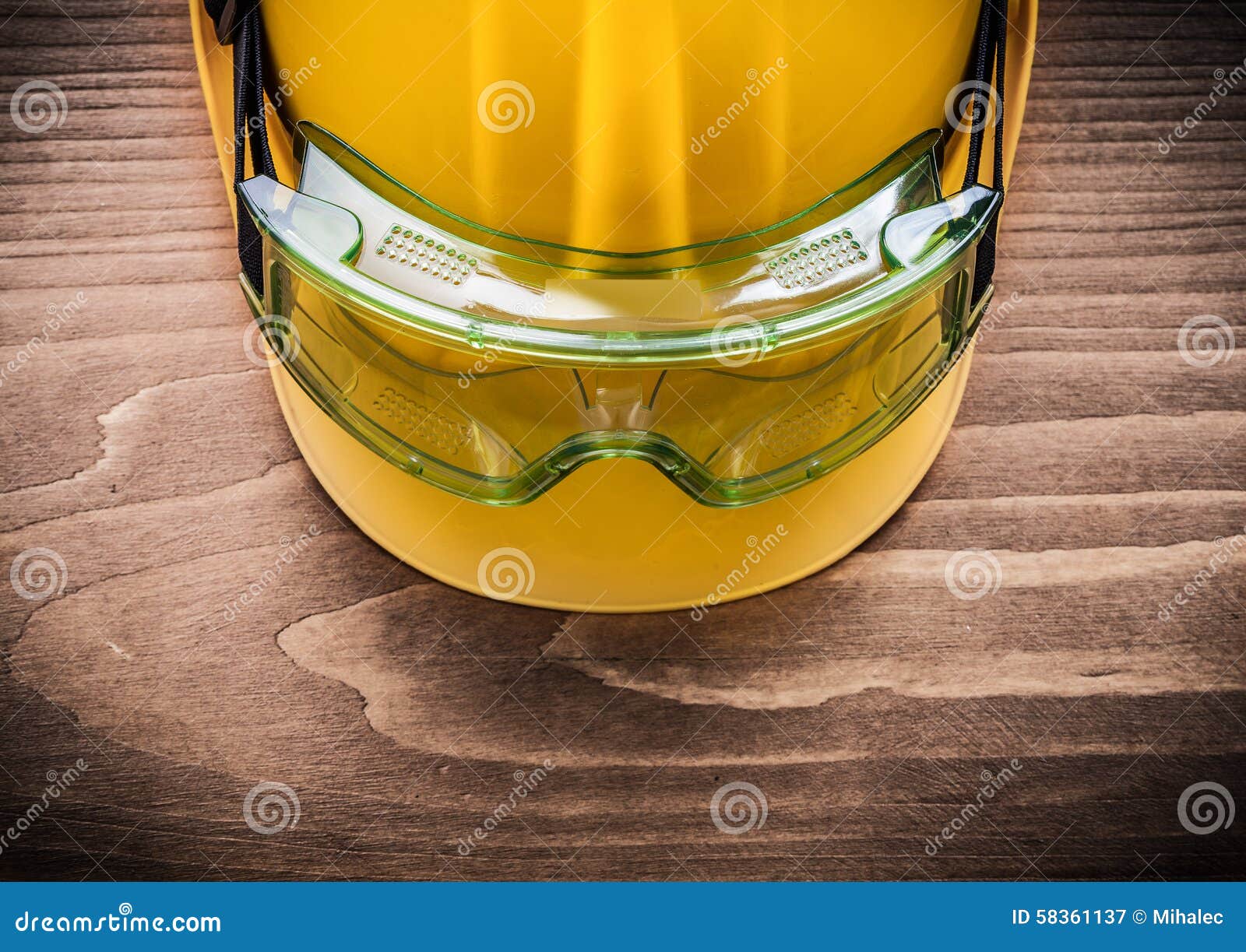 Safety Spectacles and Building Helmet on Wooden Board Constructi Stock ...