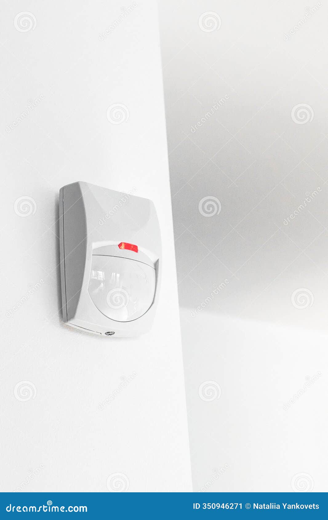 Safety System. Motion Sensor of the Security System on a White Wall ...