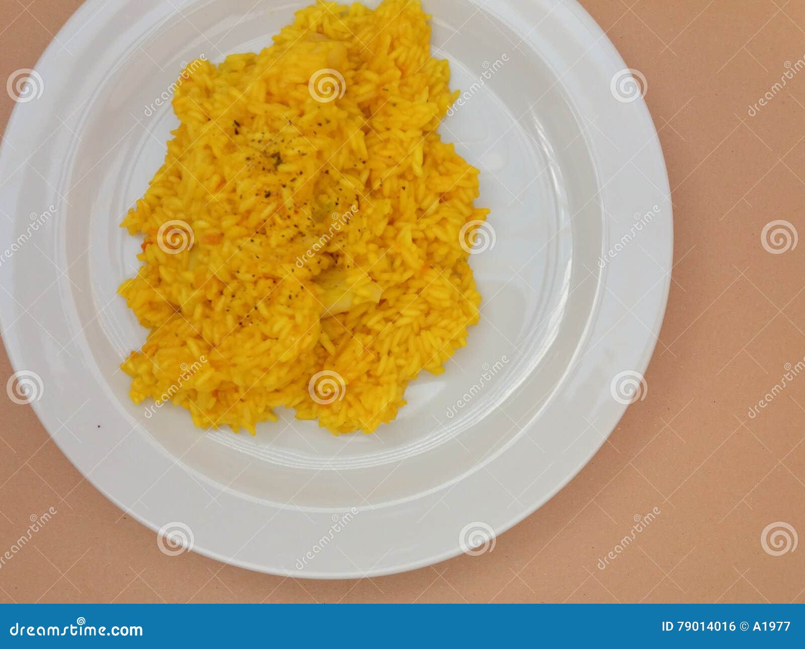 Saffron risotto in a dish stock photo. Image of carnaroli - 79014016