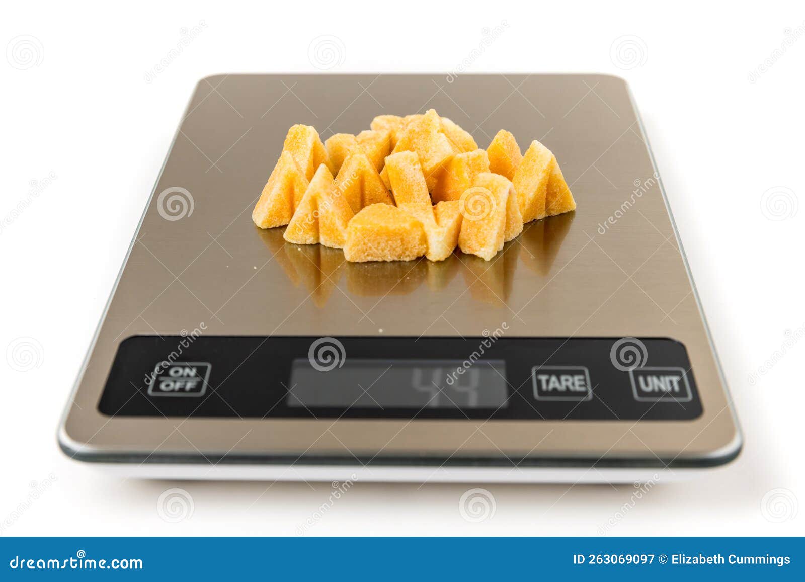 Saffron Spiced Sugar Cubes Piled on a Scale Over White Stock Image ...