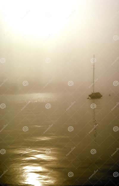 Sail boat in the fog stock photo. Image of mast, line, reflection - 37588