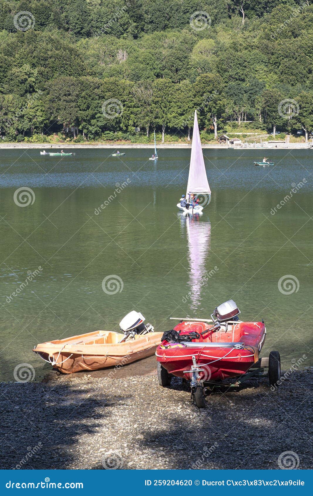 Sailboat on the beach stock photo. Image of water, beach - 259204620